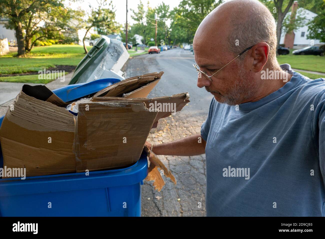 Man Throwing Rubbish In Bin High Resolution Stock Photography and ...