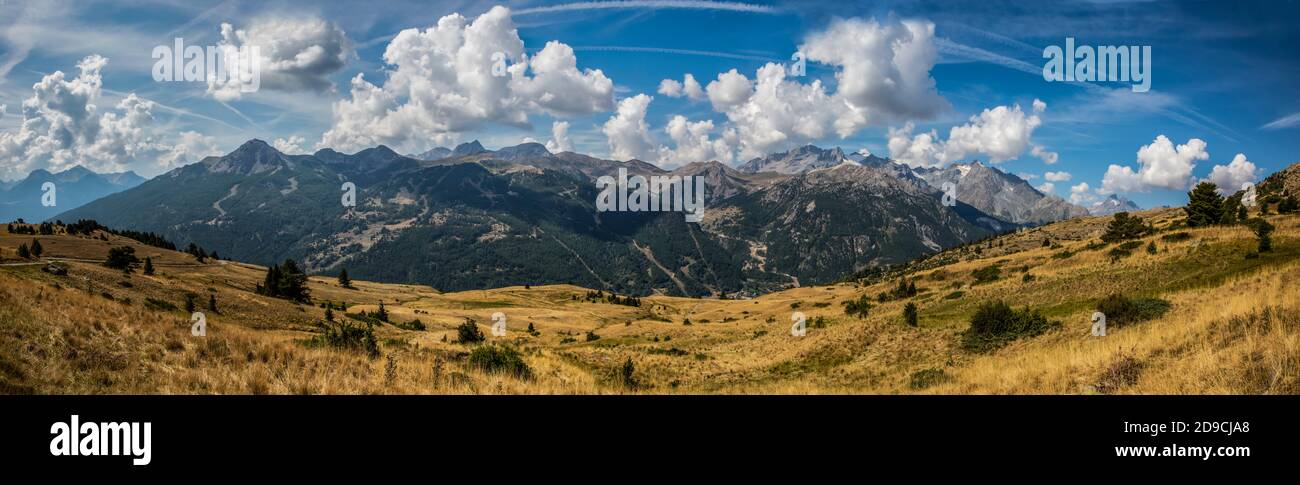 Panoramic image of the Massif des Ecrins seen from the road climbing to ...