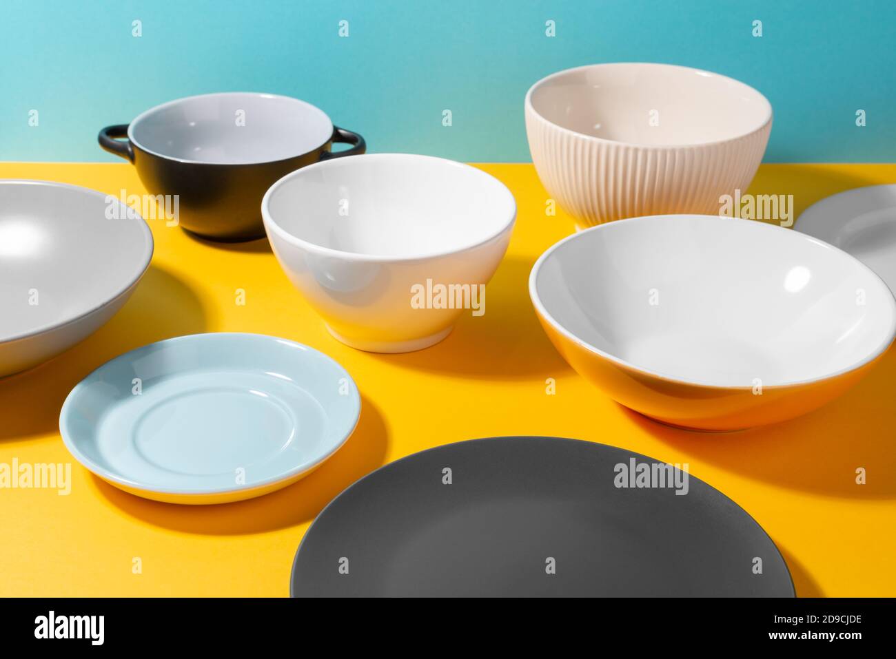 Set of empty black ceramic plates hi-res stock photography and images ...
