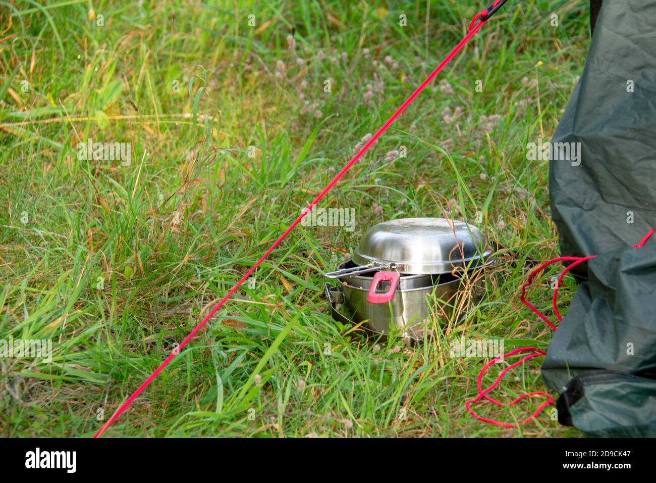 portable camping cooking pots on the grass in Markische Schweiz Buckow ...