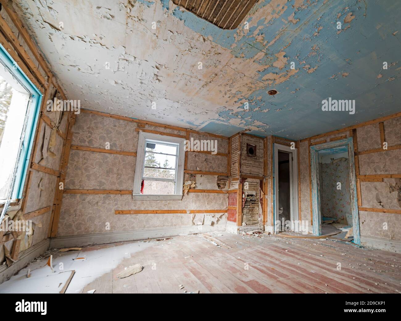 Inside an abandoned house. Walls falling apart. Ceiling damaged Stock ...