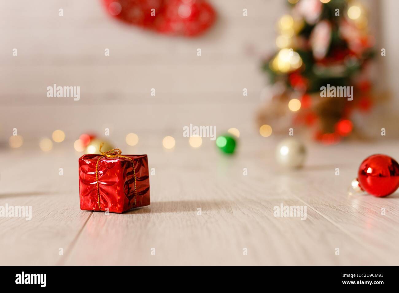 small red gift box in christmas decoration Stock Photo - Alamy