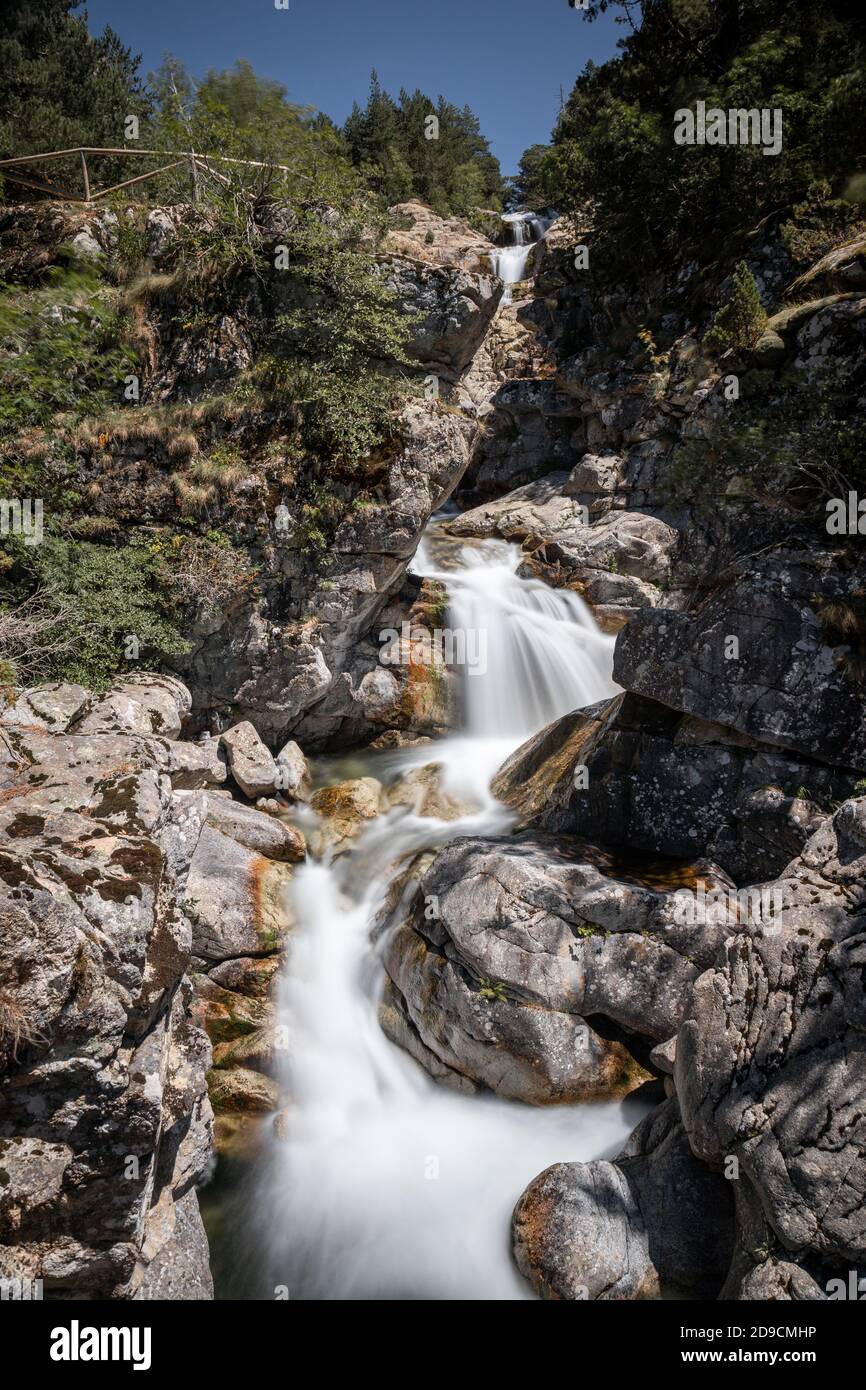 Idyllic view of waterfall in forest, Spanish Pyrenees mountain,long ...