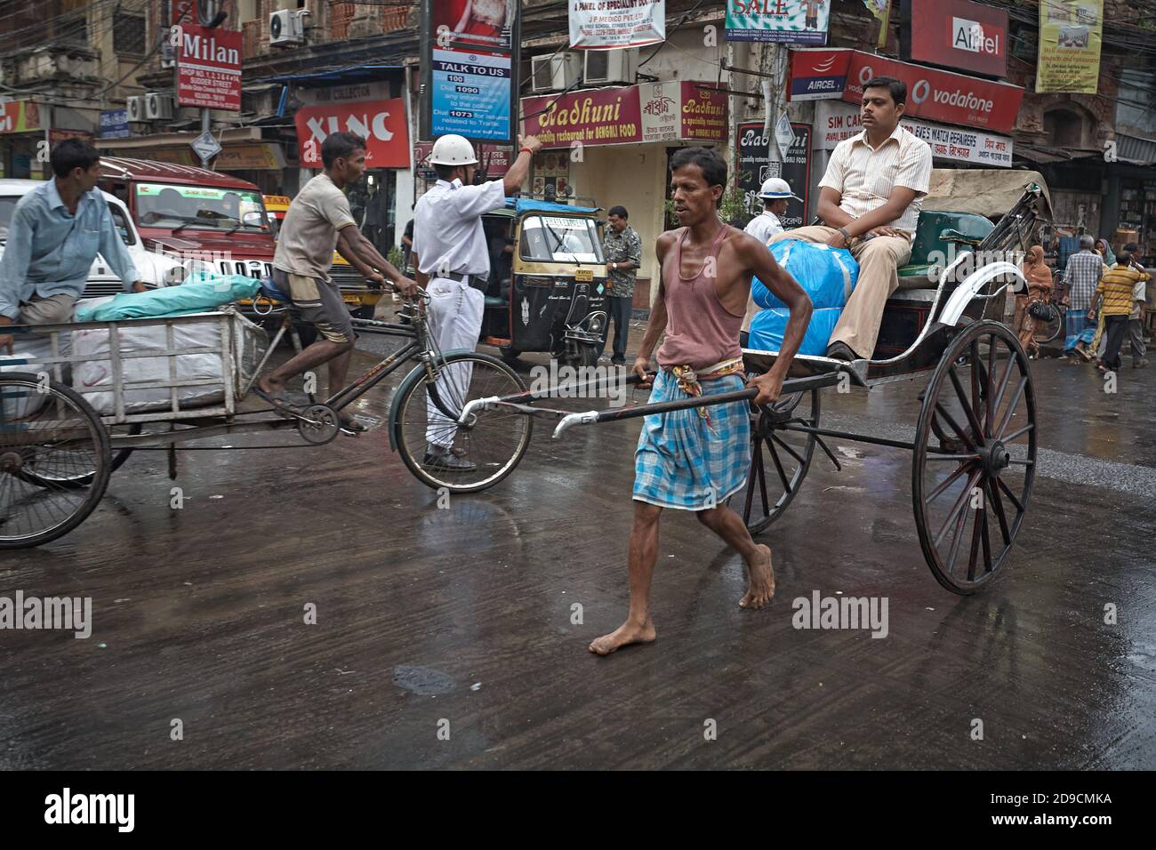 Transporting cycle rickshaw hi-res stock photography and images - Alamy