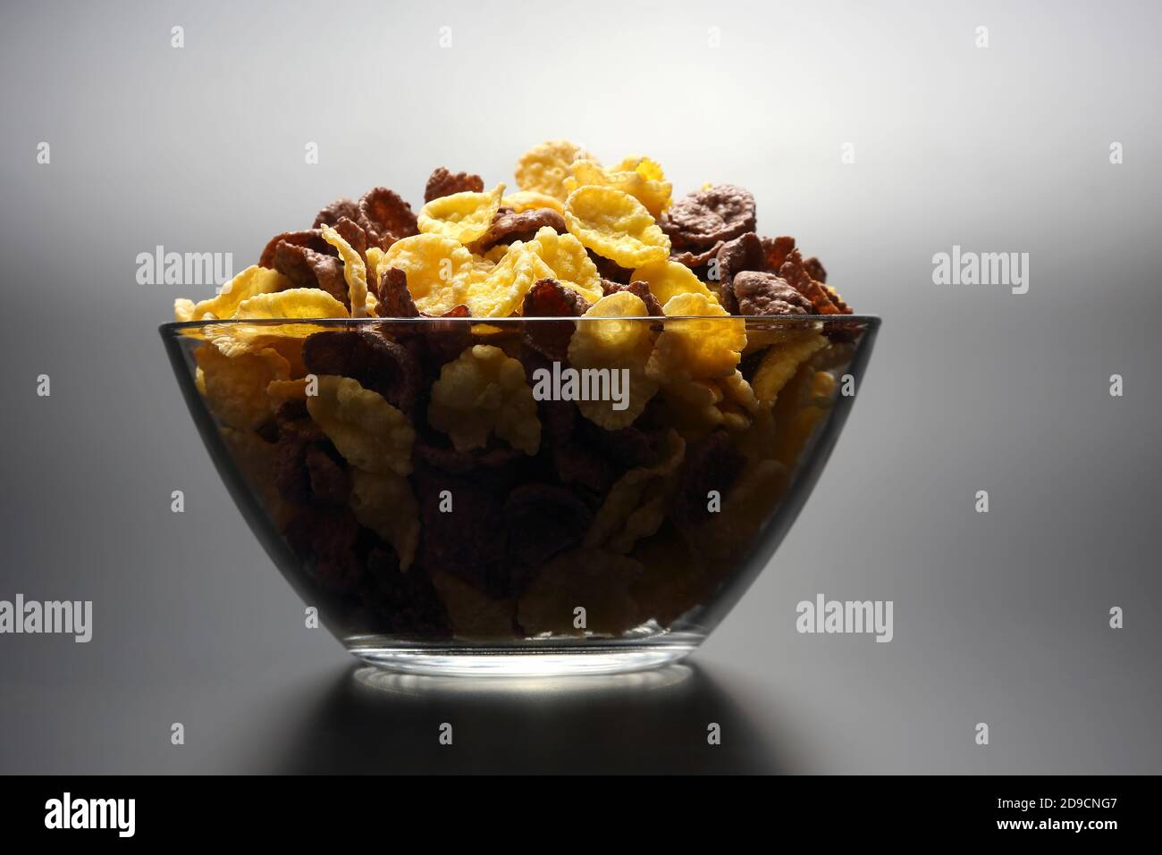 colored corn flakes in a bowl Stock Photo - Alamy