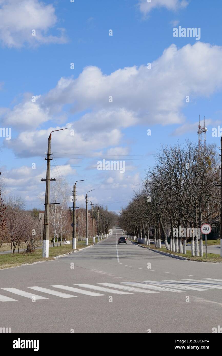 Car drives along straight road hi-res stock photography and images - Alamy