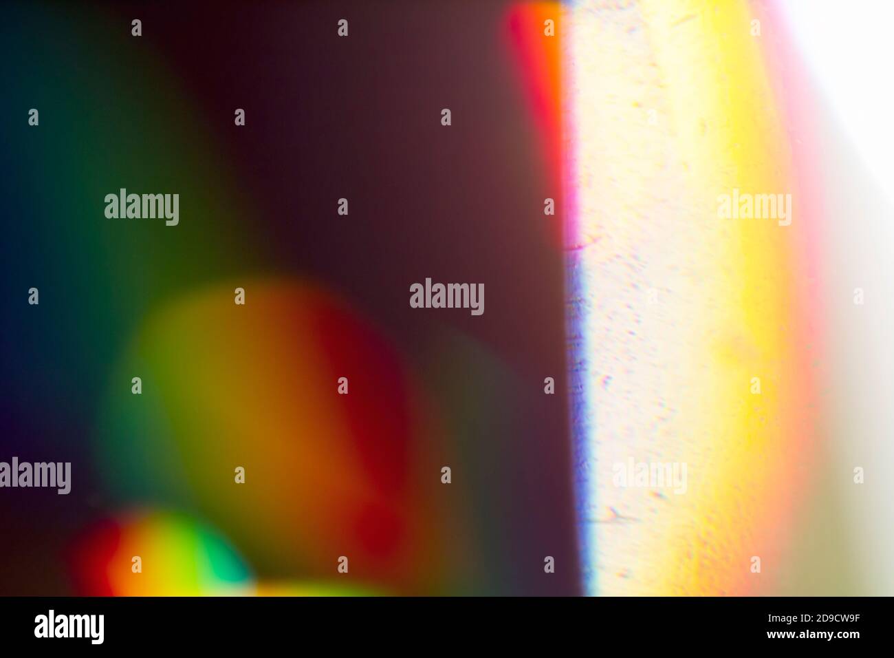 Colourful lens flare and haze on black background Stock Photo - Alamy