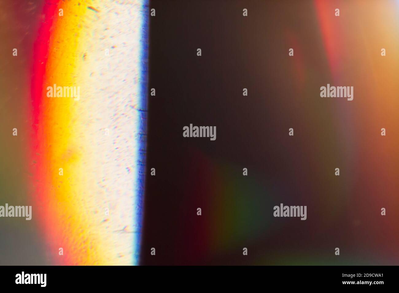 Colourful lens flare and haze on black background Stock Photo - Alamy