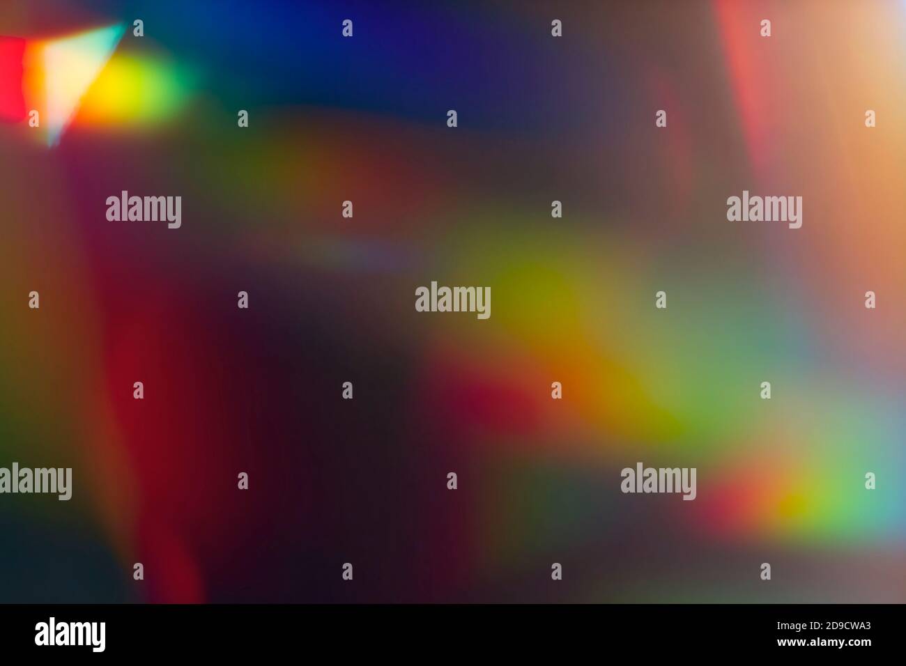 Colourful lens flare and haze on black background Stock Photo - Alamy