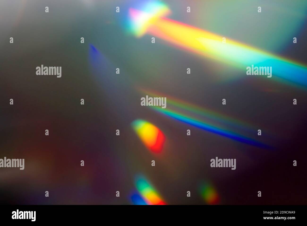 Colourful lens flare and haze on black background Stock Photo - Alamy