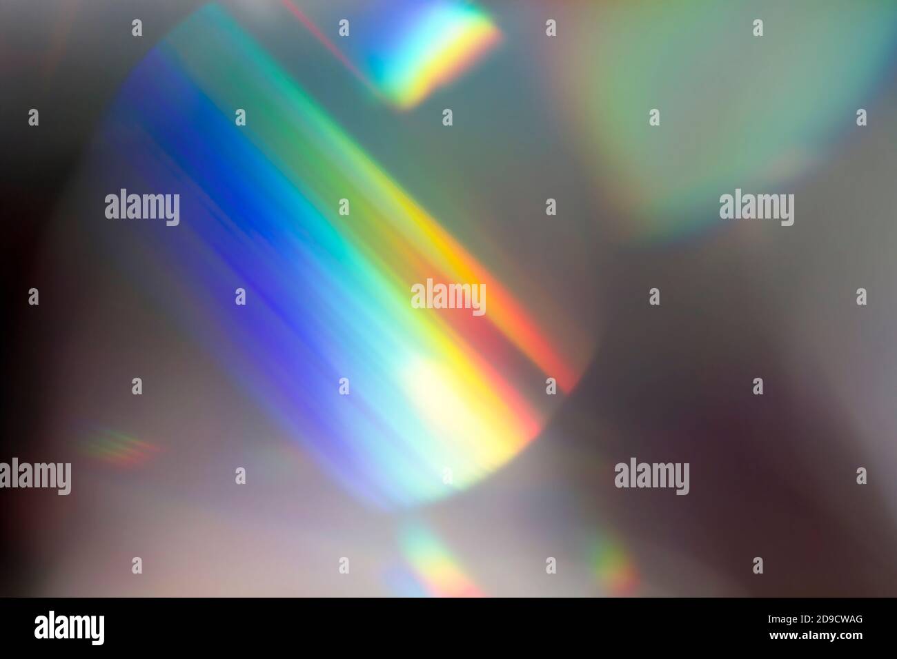 Colourful lens flare and haze on black background Stock Photo - Alamy