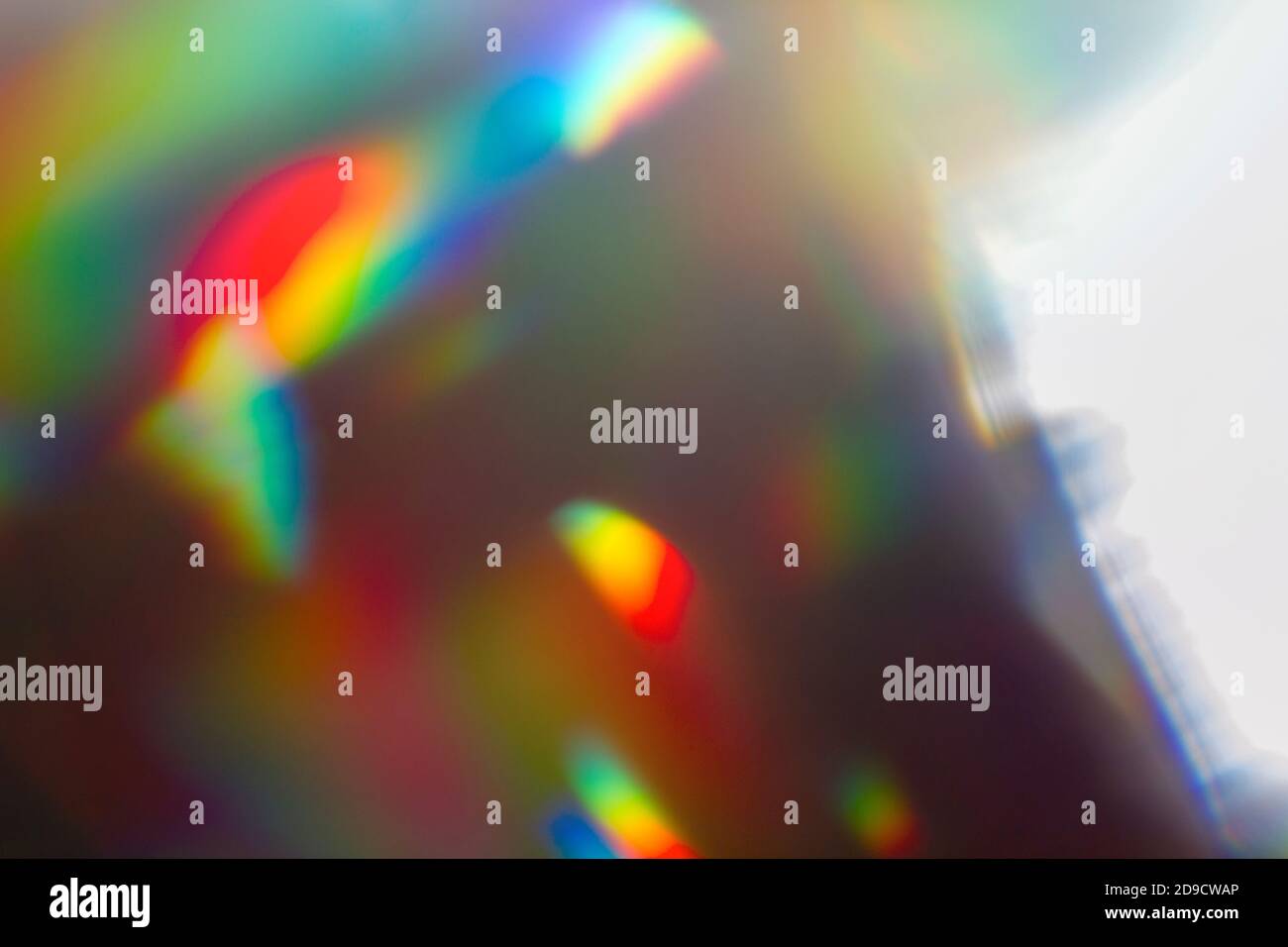 Colourful lens flare and haze on black background Stock Photo - Alamy