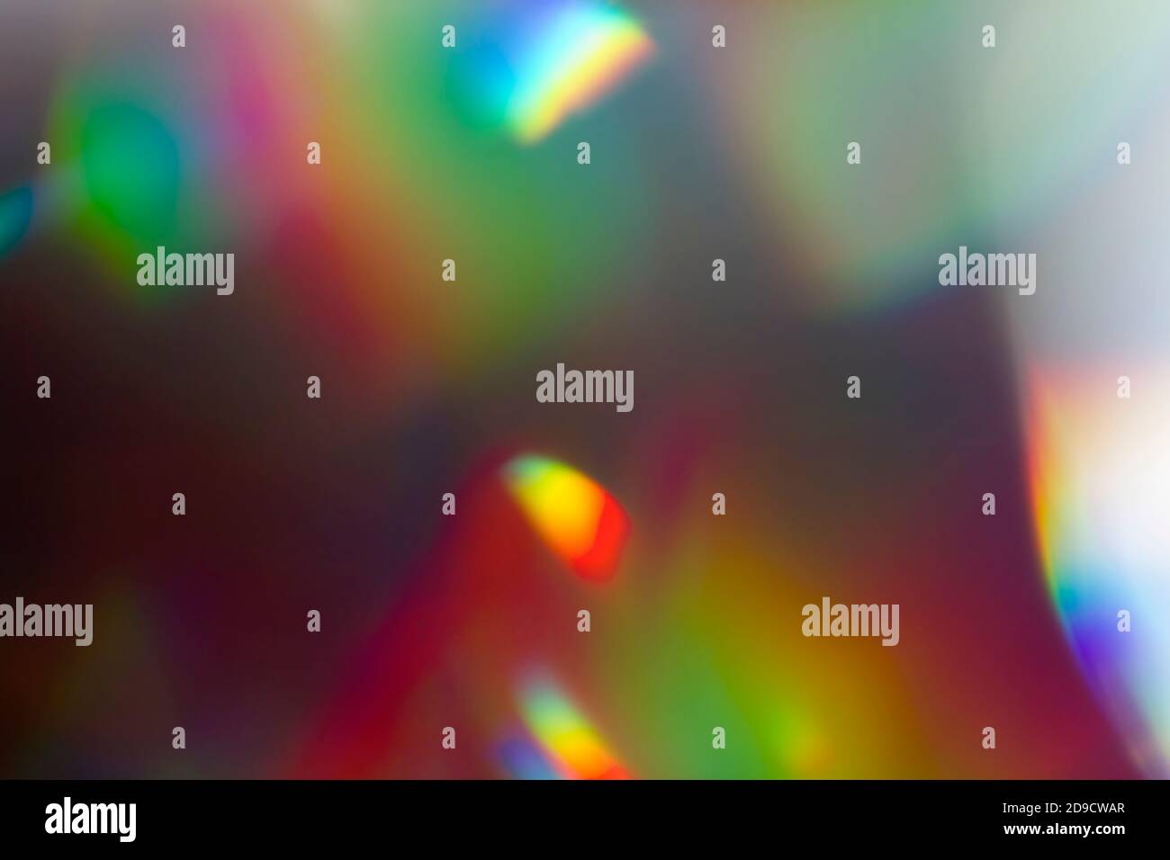 Colourful lens flare and haze on black background Stock Photo - Alamy