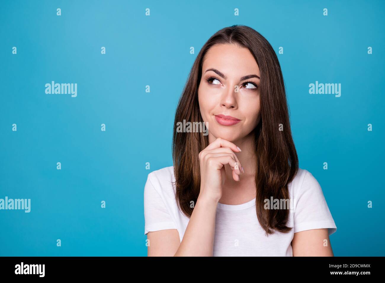 Closeup photo of attractive charming lady hold arm on chin look flirty ...