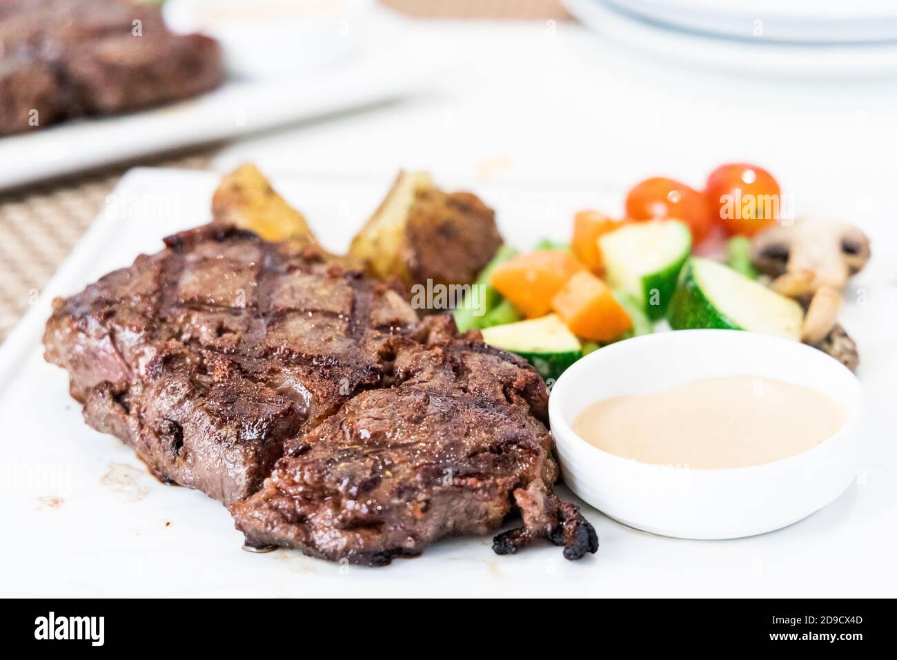 Serving portion of delicious grilled wagyu beef steak Stock Photo - Alamy