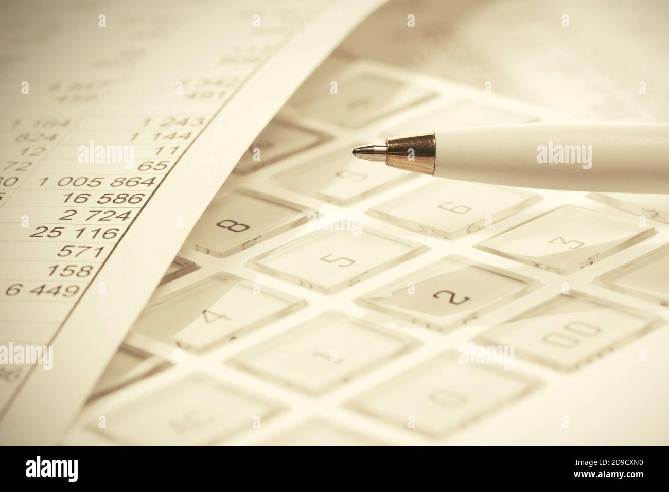 Financial accounting Pen and calculator on balance sheets Stock Photo ...