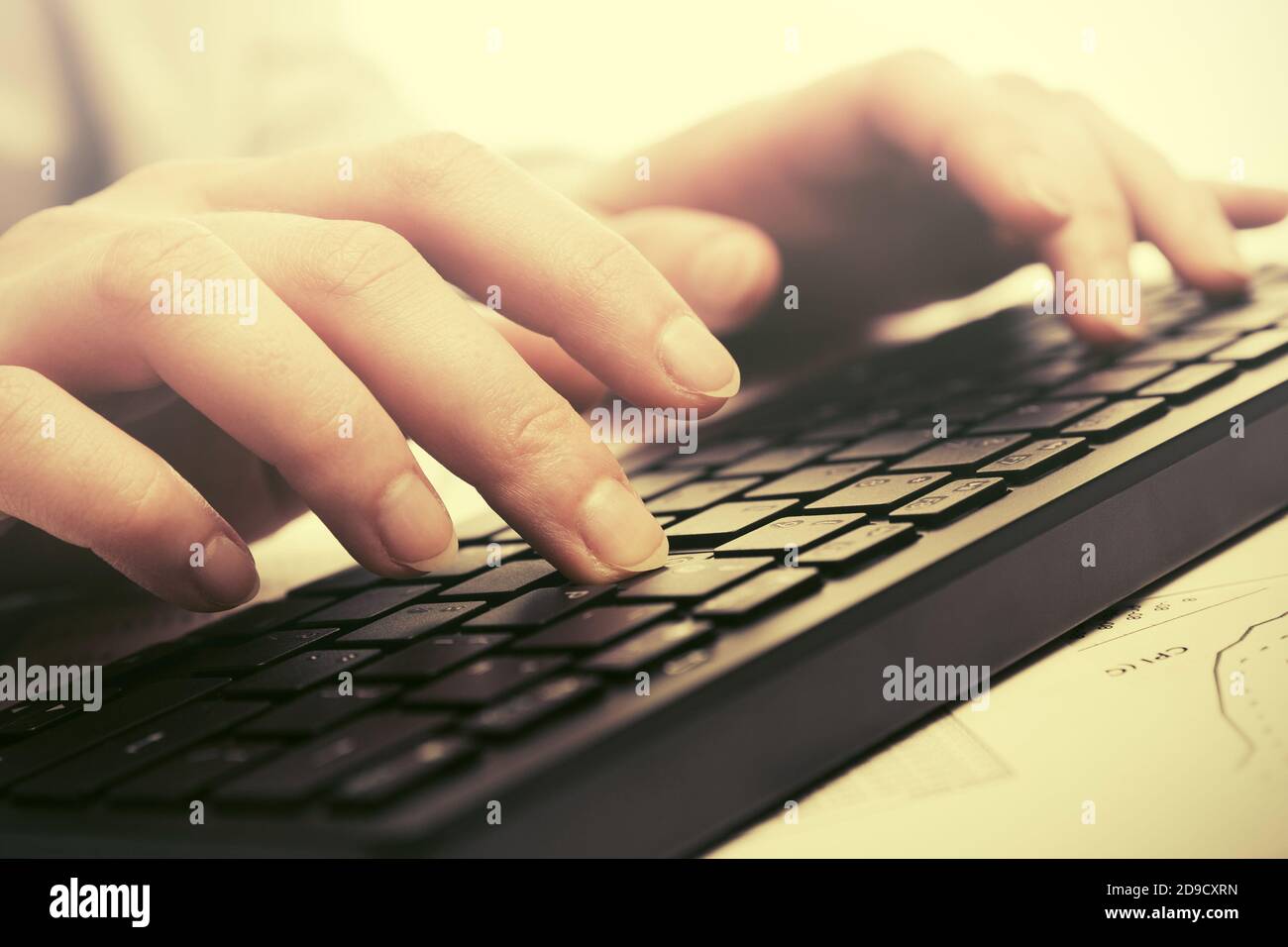 Black woman typing at computer hi-res stock photography and images - Alamy