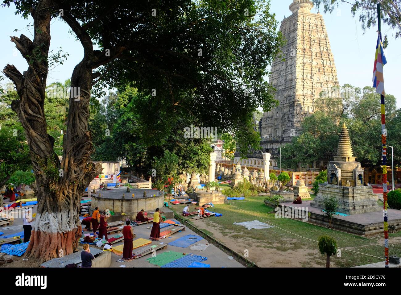 India Bodh Gaya - Mahabodhi Temple Complex area view with praying monks ...