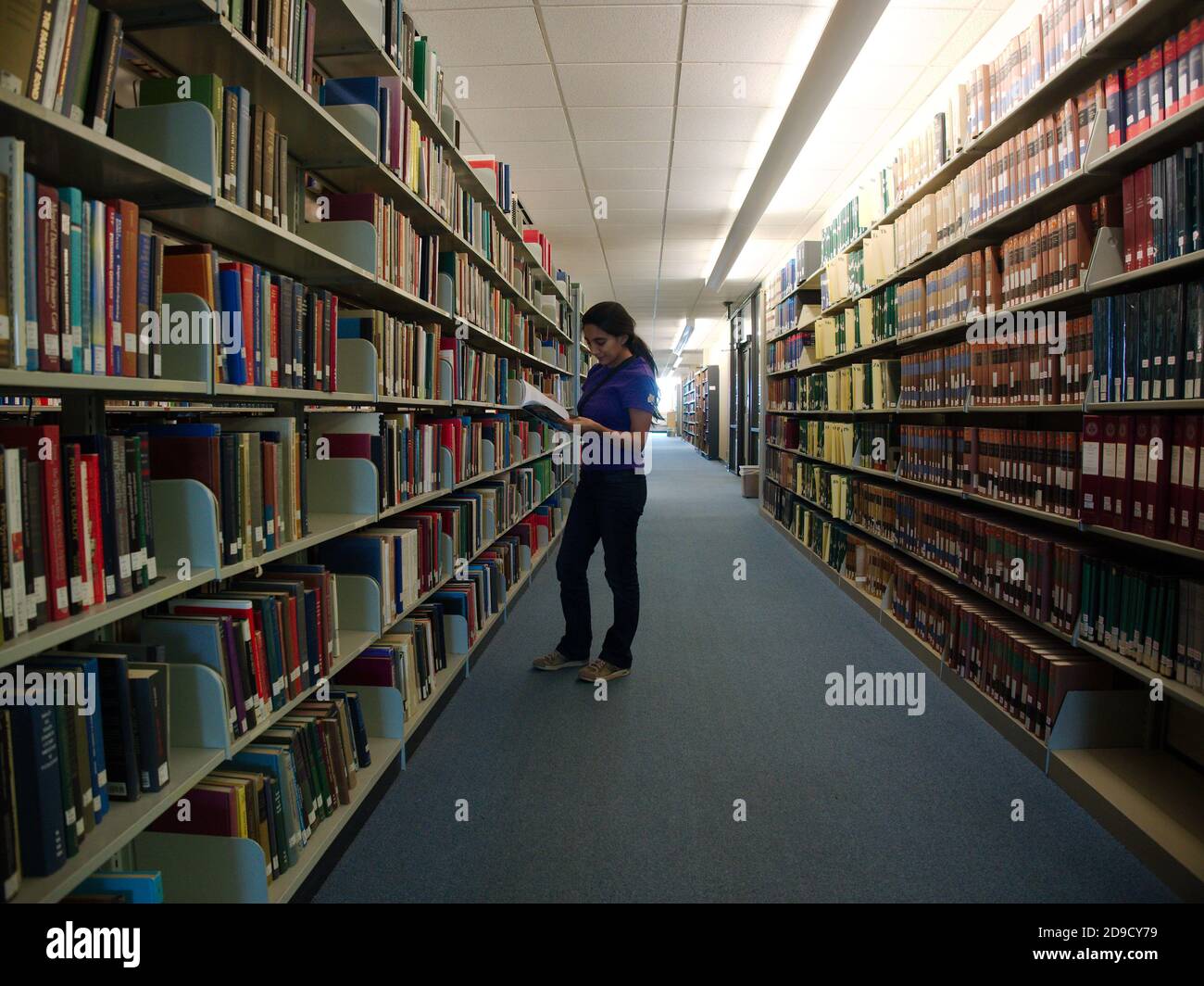 Baton Rouge, Louisiana, USA - 2020: A student looks at a book at ...