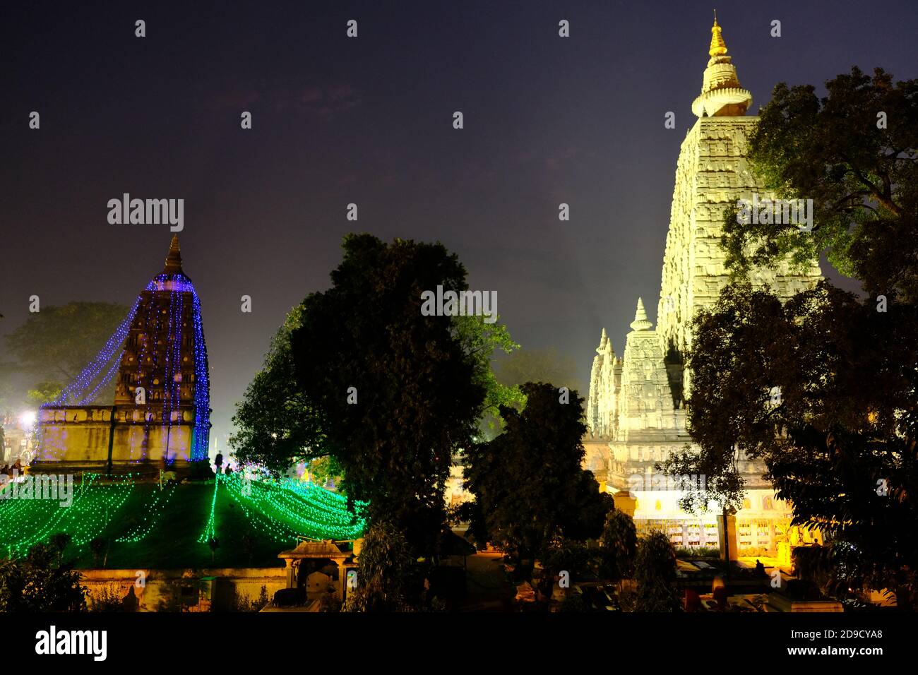 India Bodh Gaya - Mahabodhi Temple Complex illuminated temple during ...