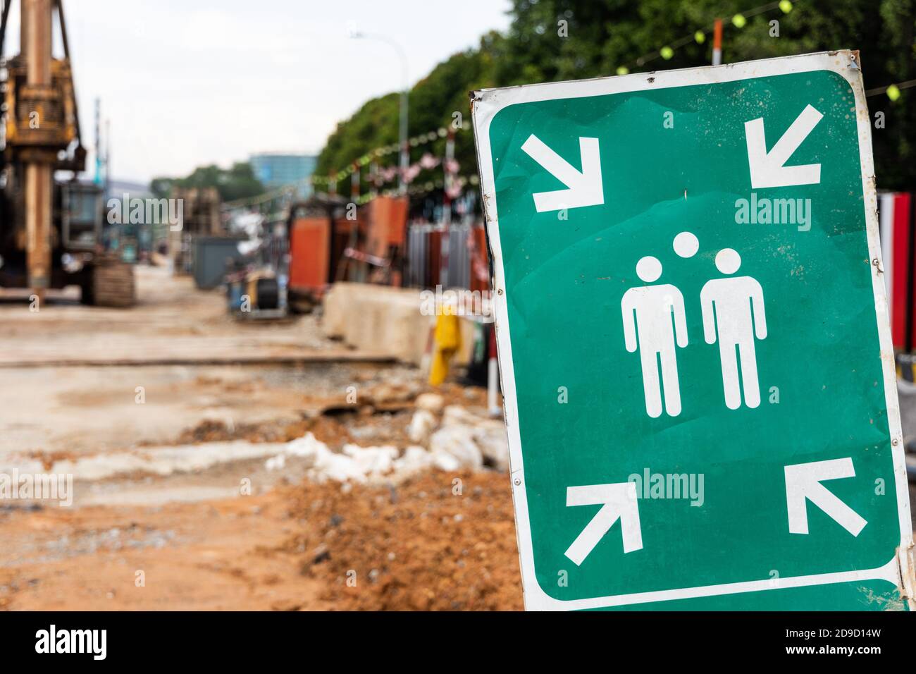 Assembly Point signage with construction site background Stock Photo ...