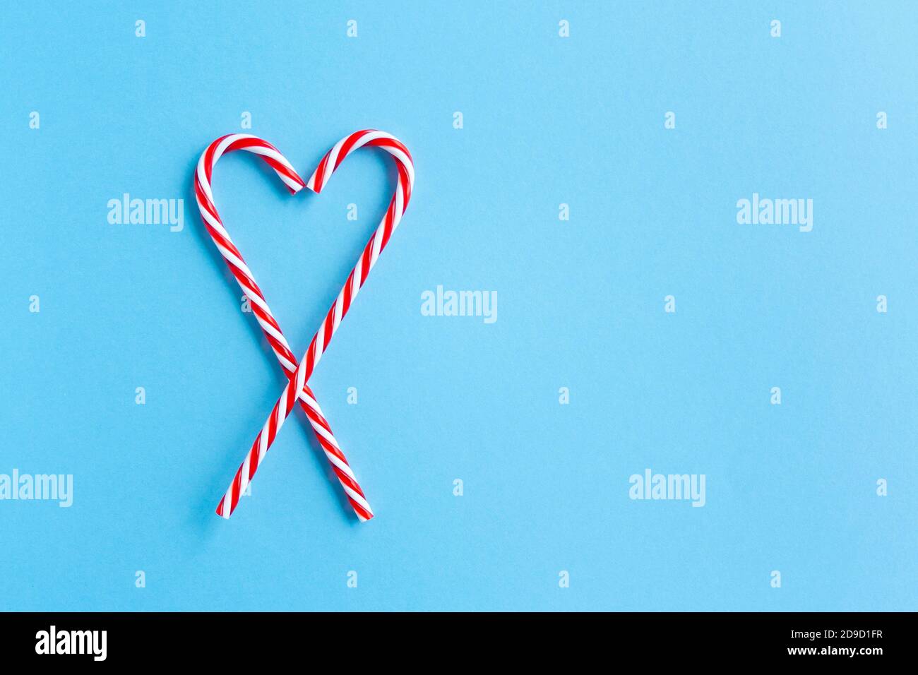 Christmas candy canes and fir branches flat lay Stock Photo - Alamy