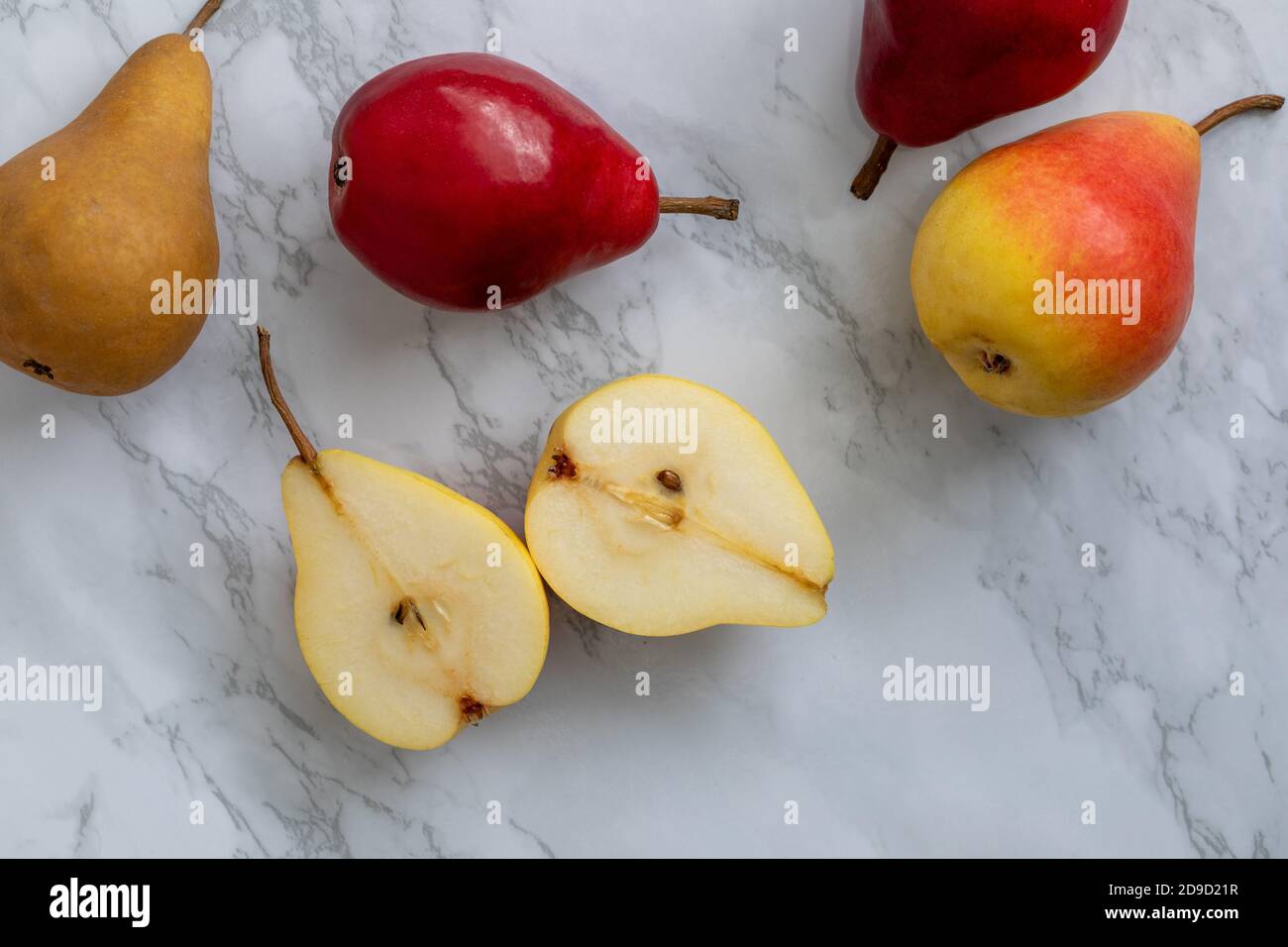 tabletop collection of Pears, Red Anjou, Bosc, and Comic, Pyrus Malinae ...