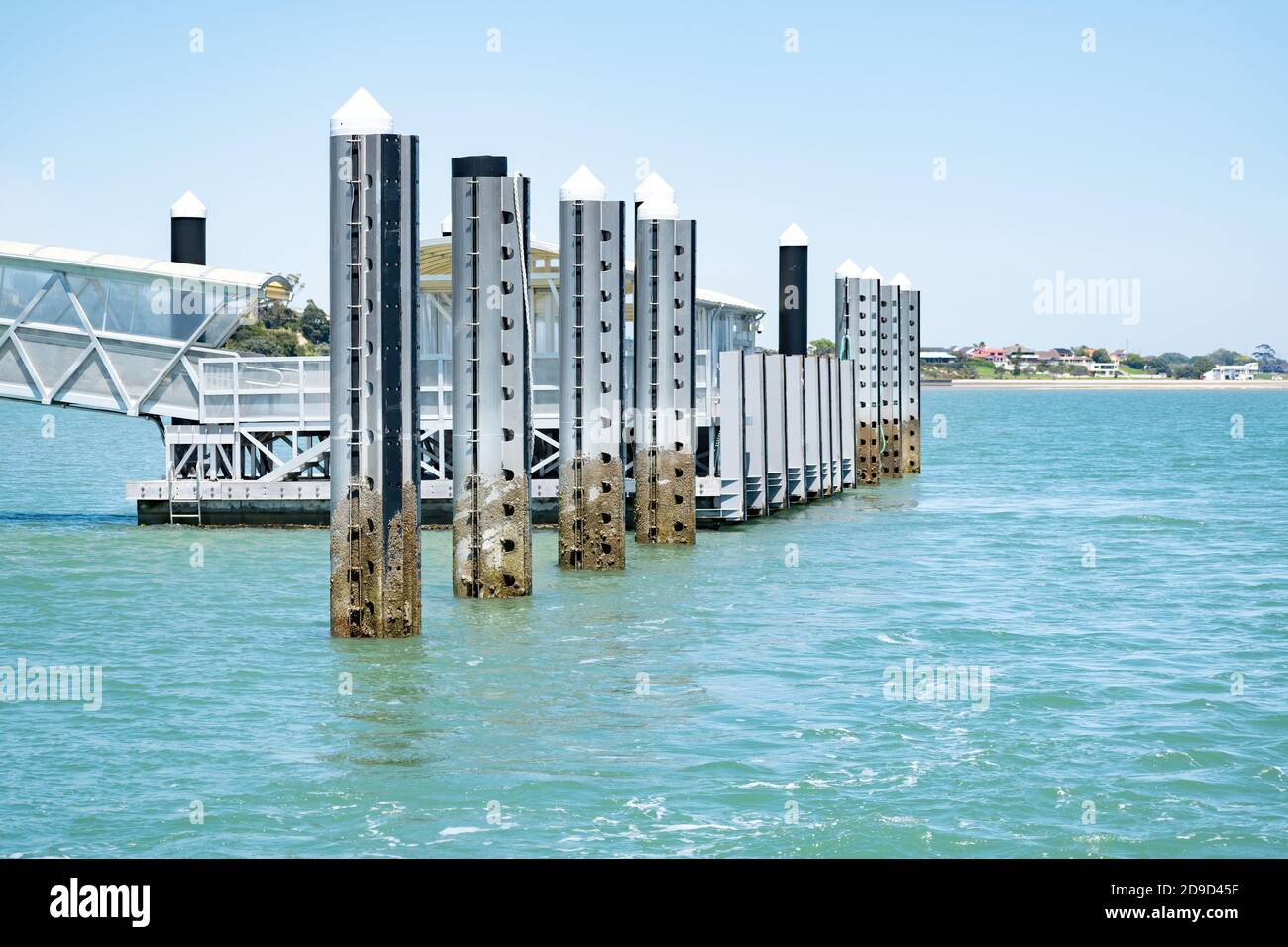 Half Moon Bay ferry floating jetty with metal pylons Stock Photo - Alamy