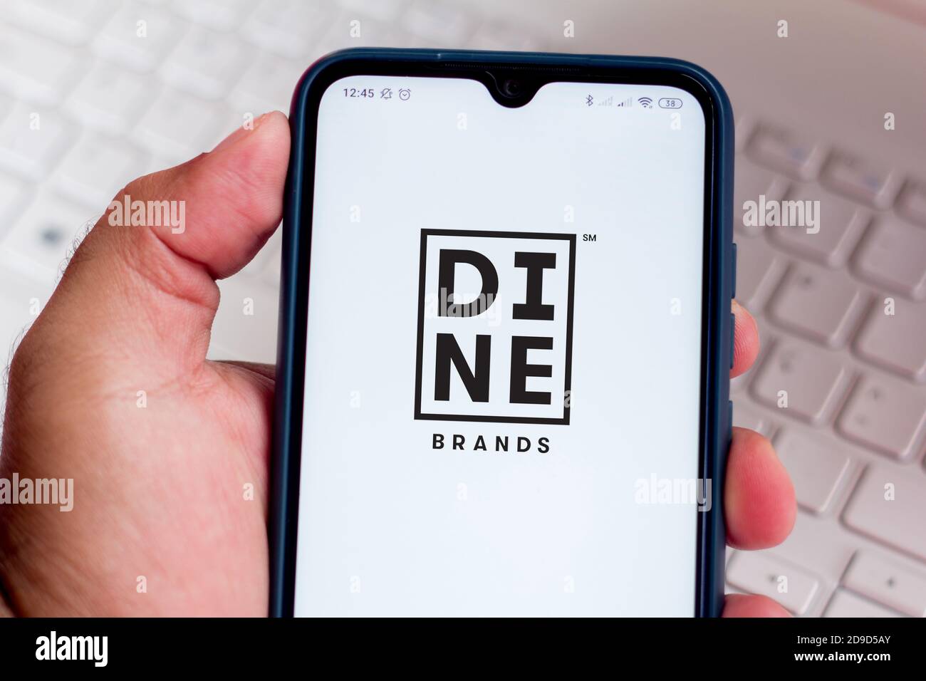 In this photo illustration the Dine Brands Global logo seen displayed ...