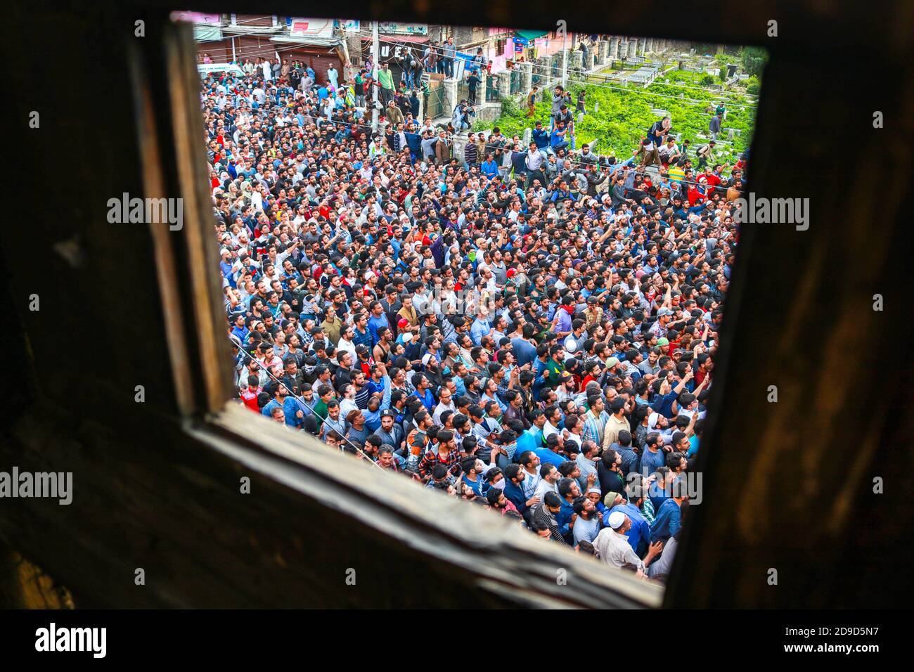 A large crowd gathered in protest on the streets. kashmir, India Stock ...
