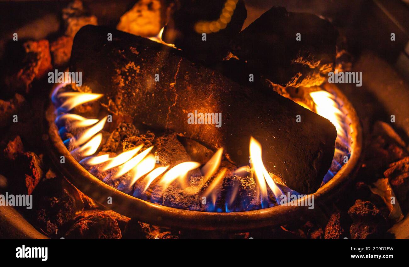 fireplace at traditional christmas market (Christkindlmarkt) at Meran ...