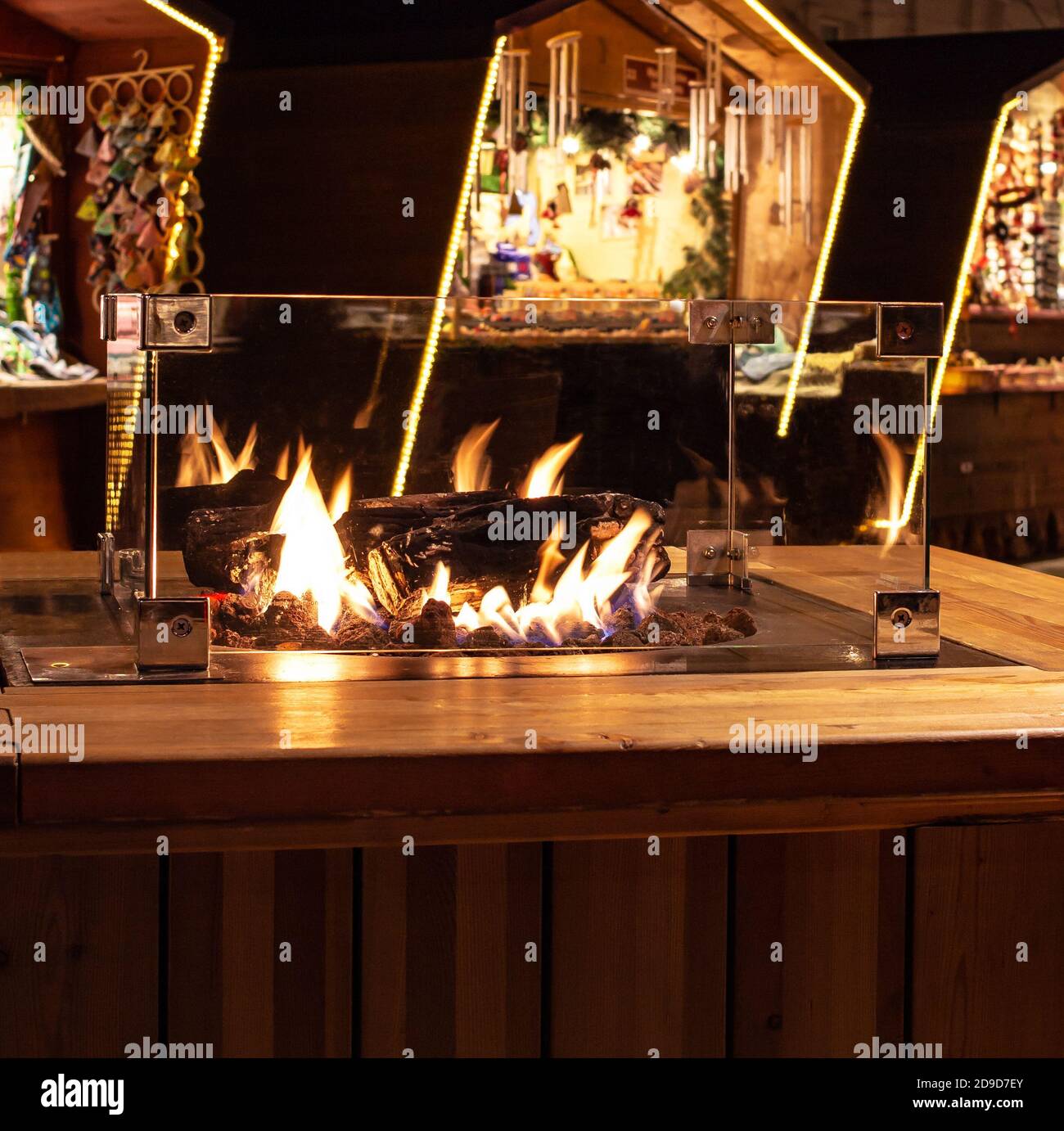fireplace at traditional christmas market (Christkindlmarkt) at Meran ...