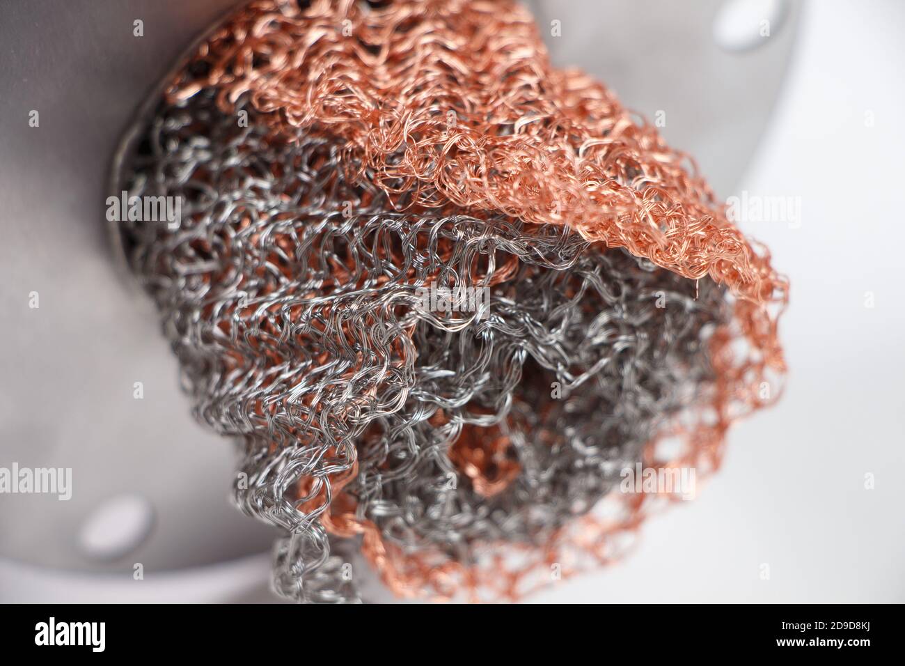 Close-up photo of metal rolled grid filter in iron pipe Stock Photo - Alamy