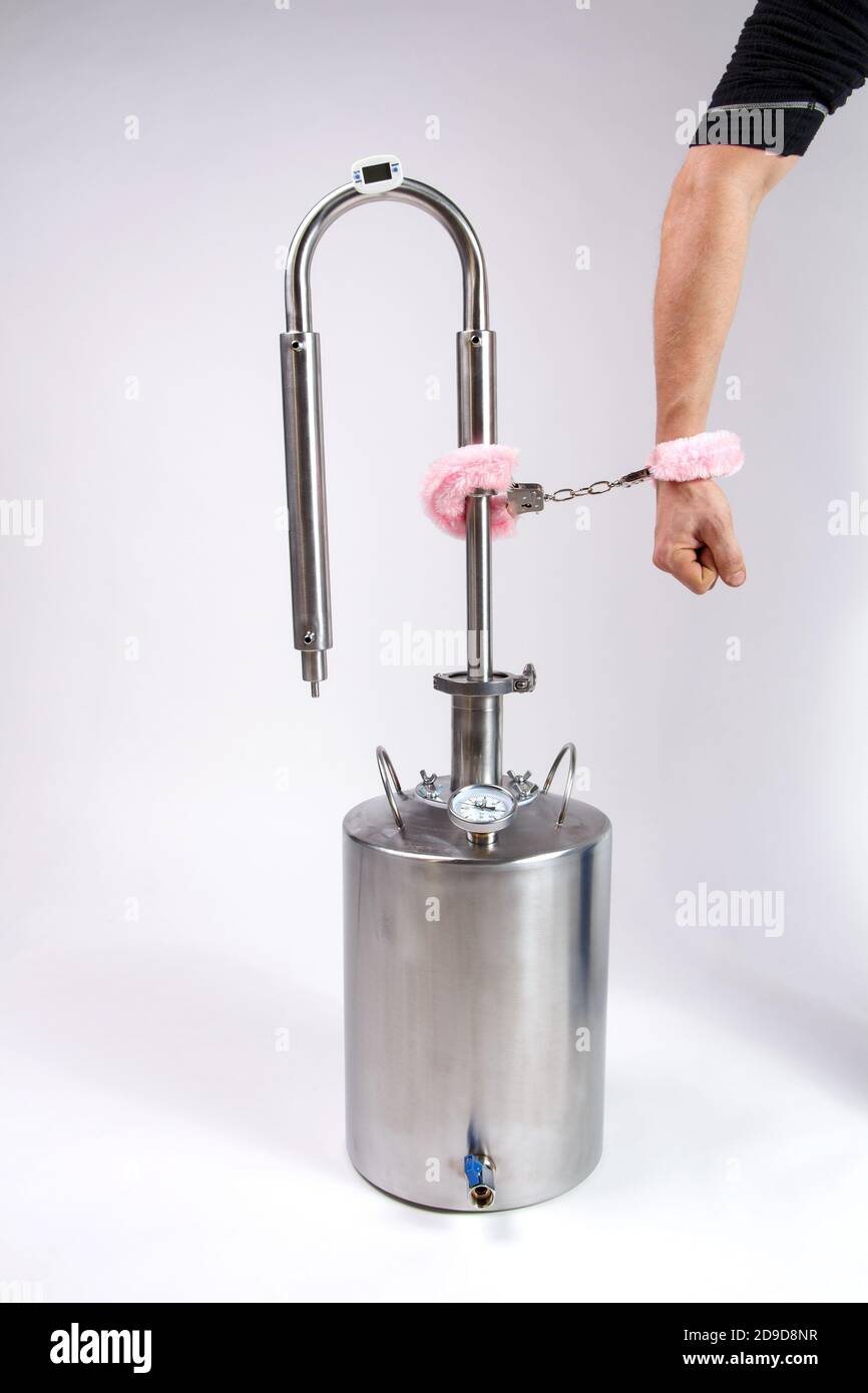 Hooch with man in handcuff mean alcohol addiction Stock Photo - Alamy