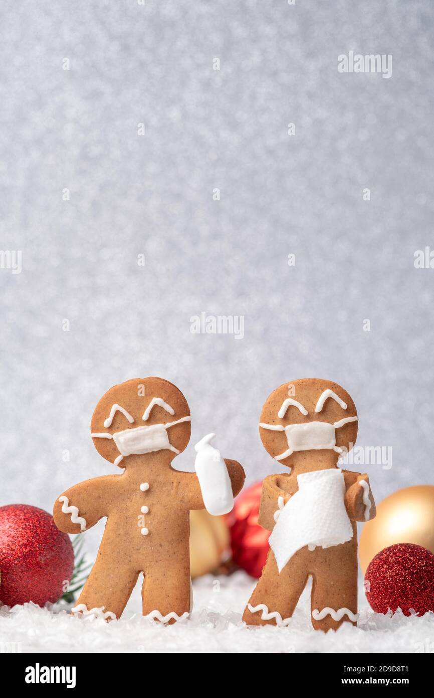 Christmas gingerbread men with a masks Stock Photo - Alamy