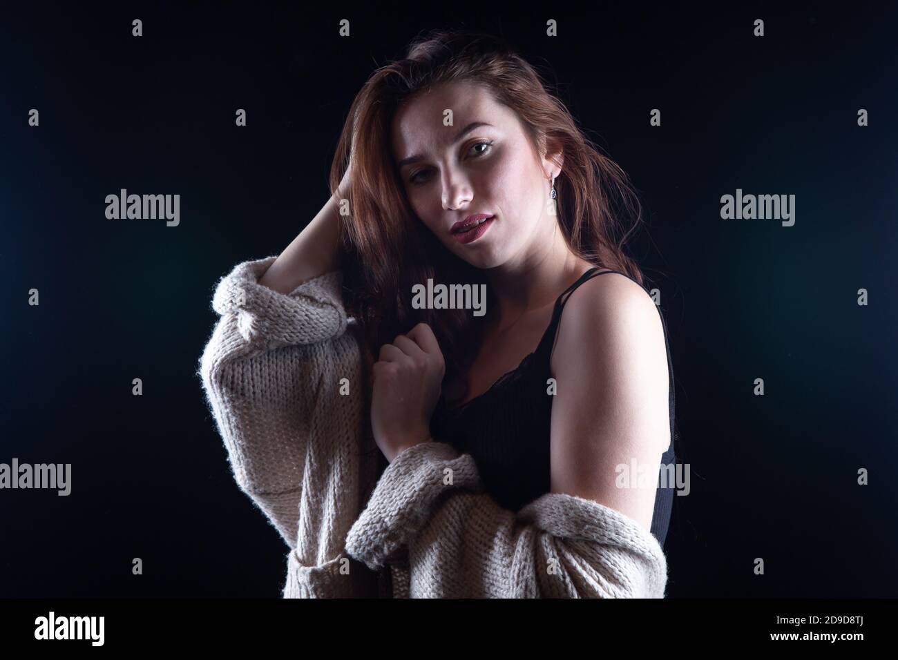 Photo of young girl with long hair in shadows Stock Photo - Alamy