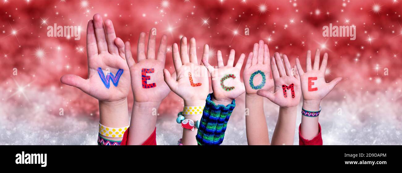 Children Hands Building Word Welcome, Red Christmas Background Stock ...