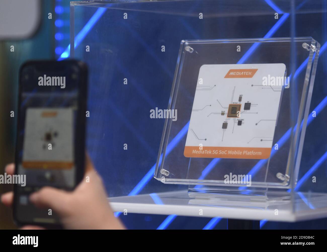 Visitors carefully observe various kinds of chips are exhibited at ...