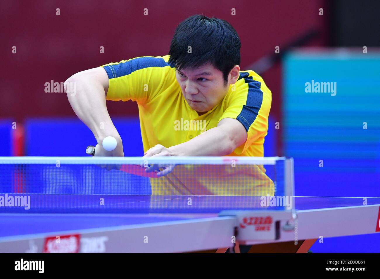 Chinese table tennis player Fan Zhendong competes against Chinese table ...