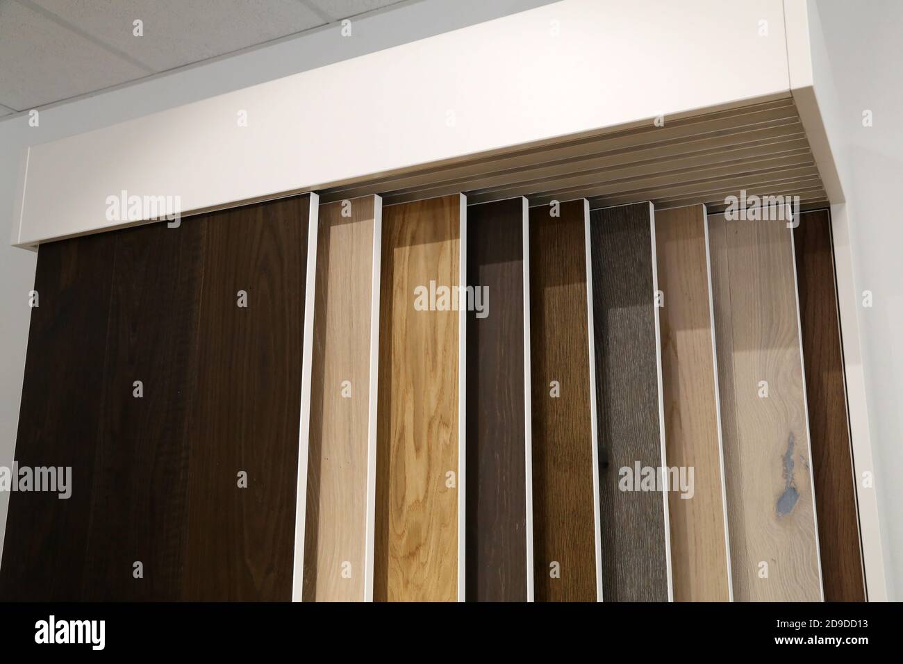 Closeup of a display of samples of laminated floor texture pattern ...