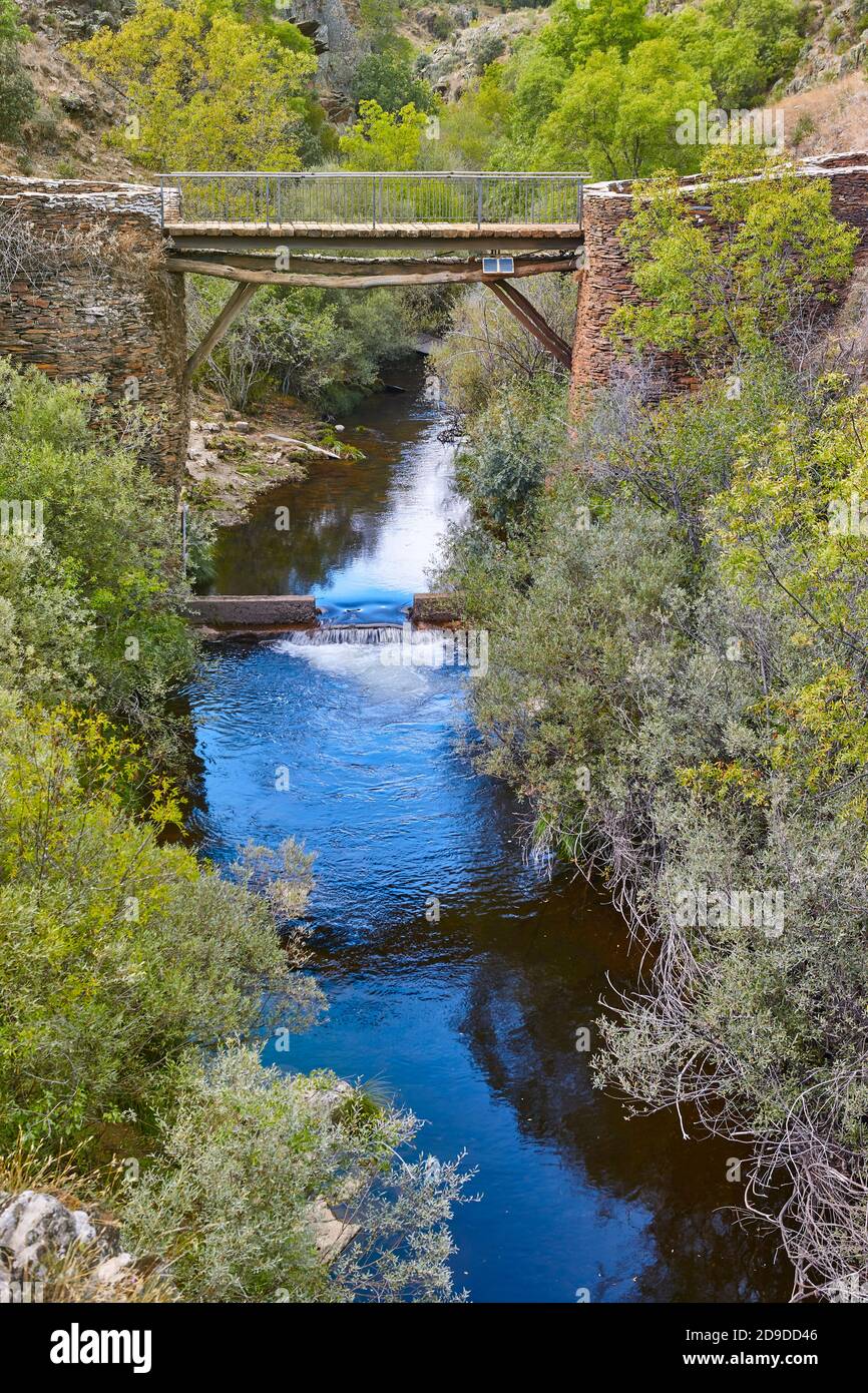 Antique slate stone bridge over Jarama river. Roblelacasa, Guadajara ...
