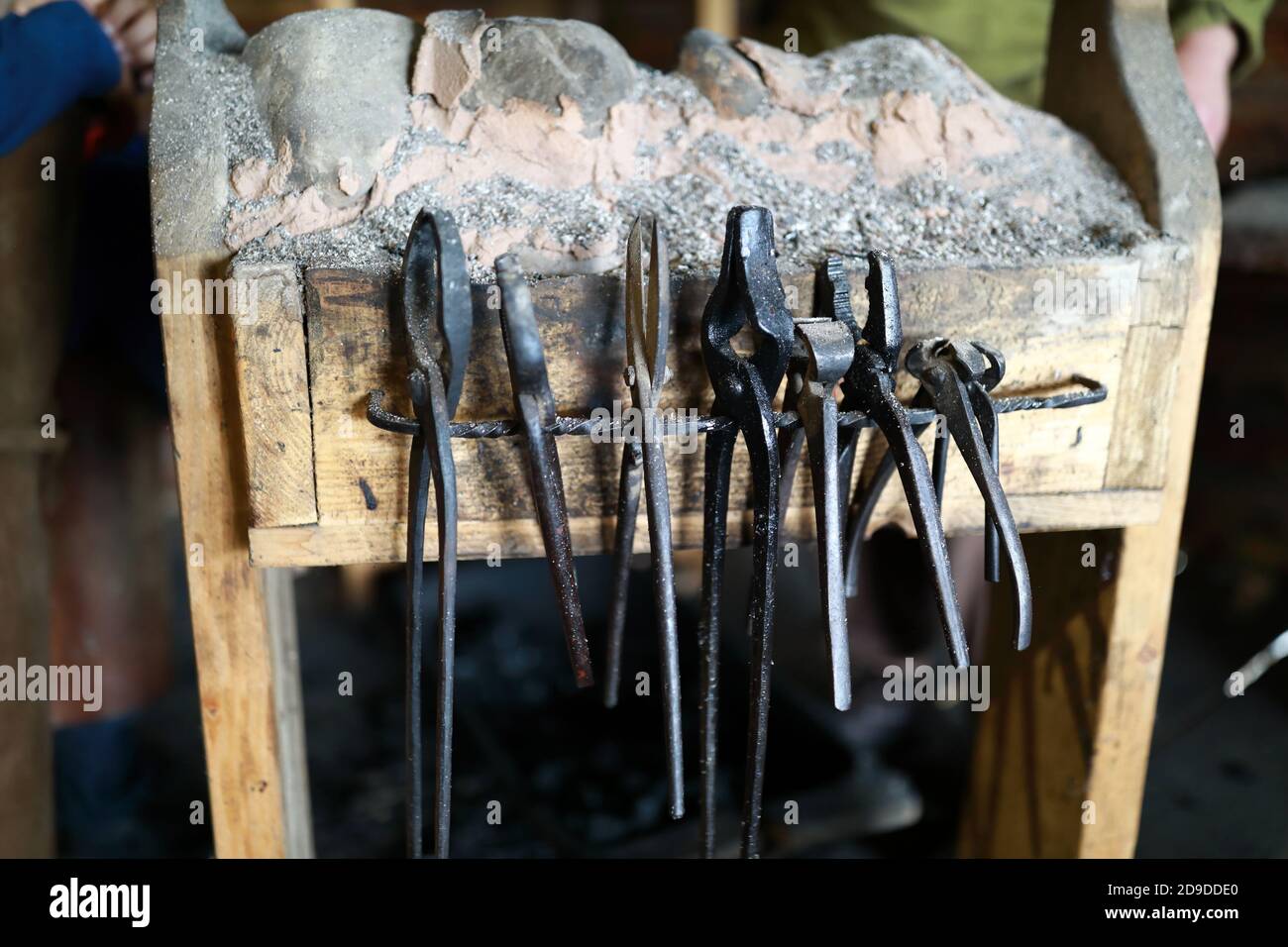 View of various iron tools in forge Stock Photo - Alamy