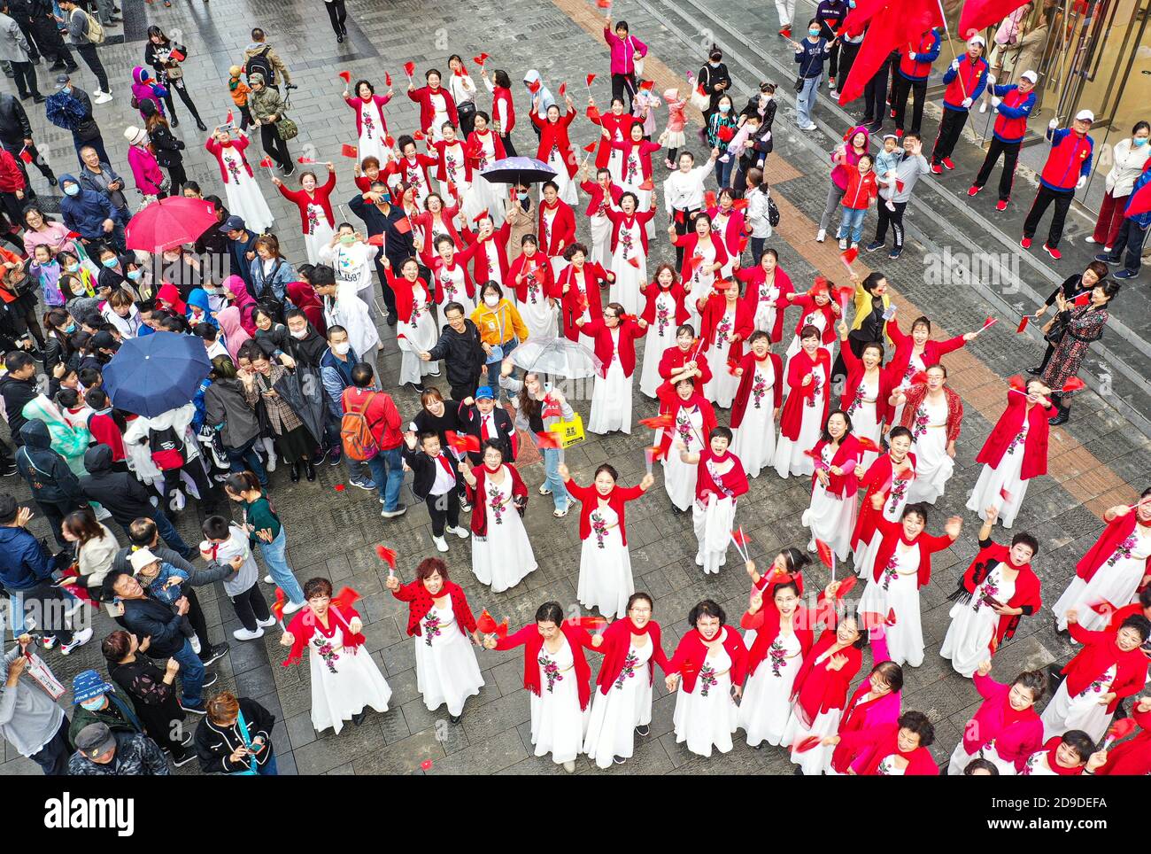 Thousands of citizens attend a flash mob to celebrate the National Day ...