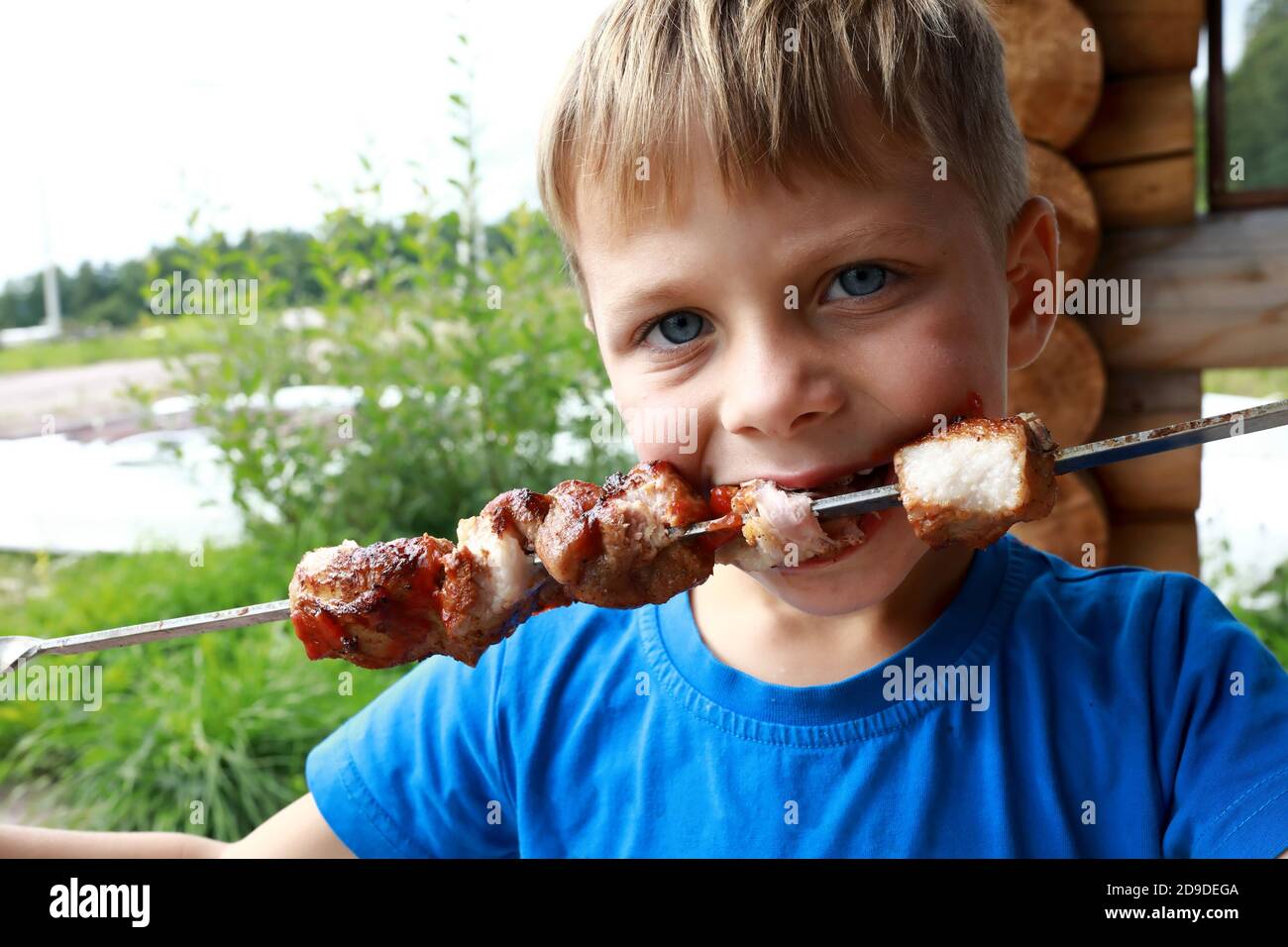 Child eating pork meat hi-res stock photography and images - Alamy