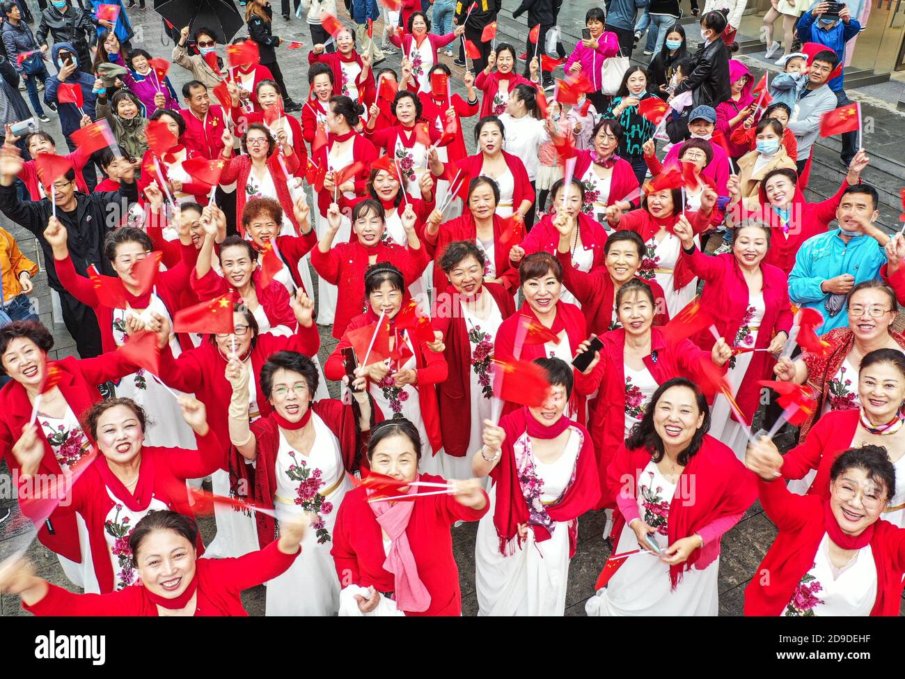 Thousands of citizens attend a flash mob to celebrate the National Day ...