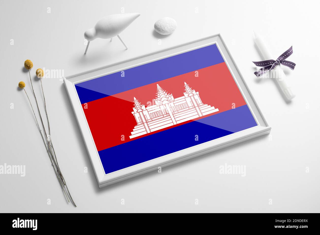 Cambodia flag in wooden frame on table. White natural soft concept ...