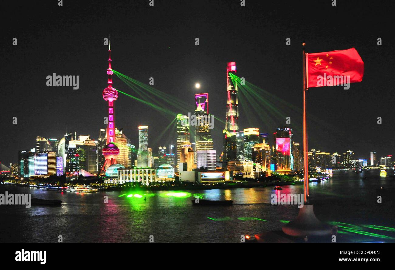 The landmarks of Shanghai illuminate with a light show to celebrate the ...