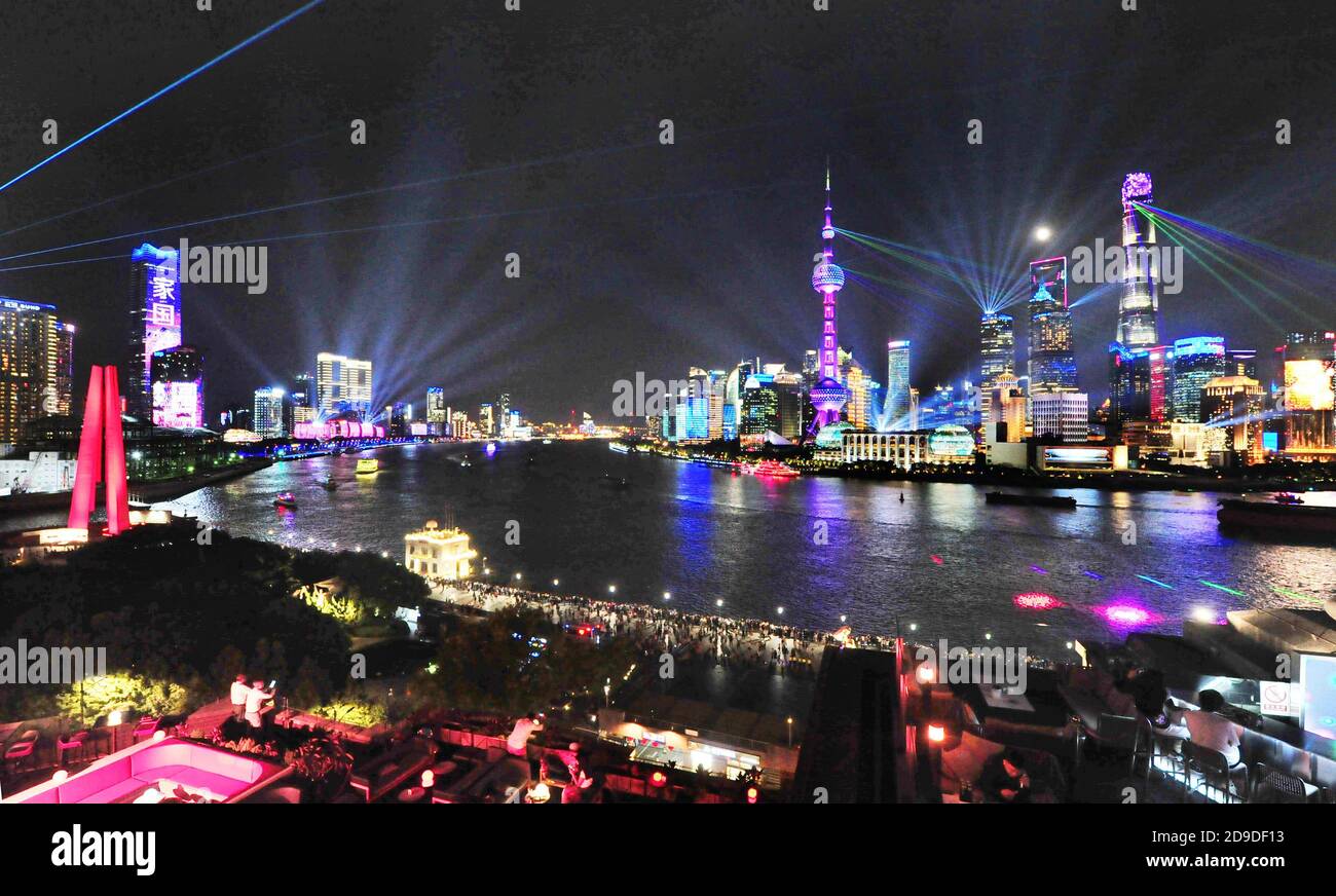 The landmarks of Shanghai illuminate with a light show to celebrate the ...