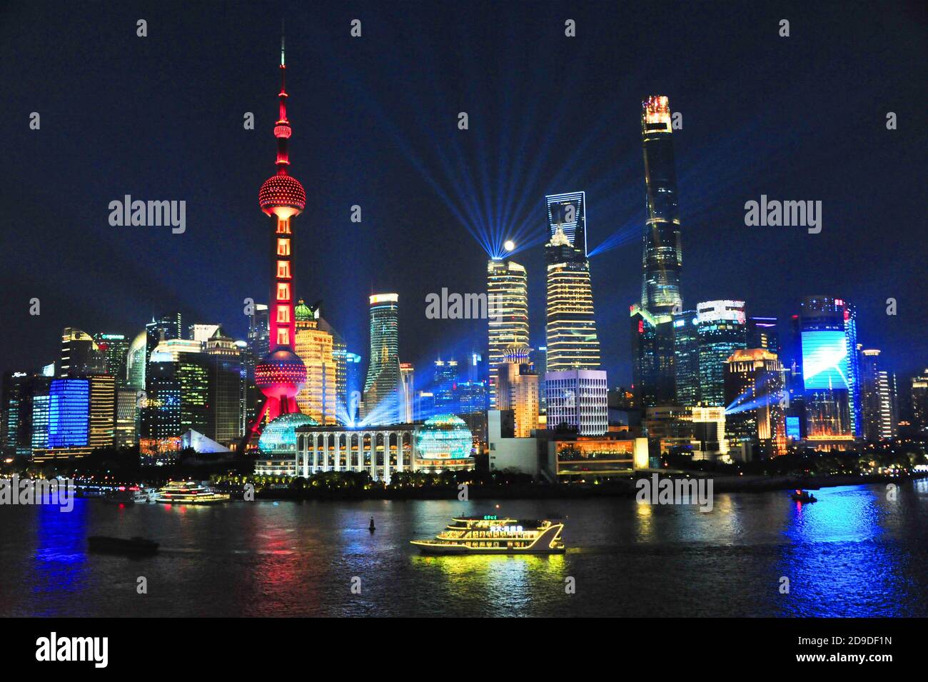 The landmarks of Shanghai illuminate with a light show to celebrate the ...