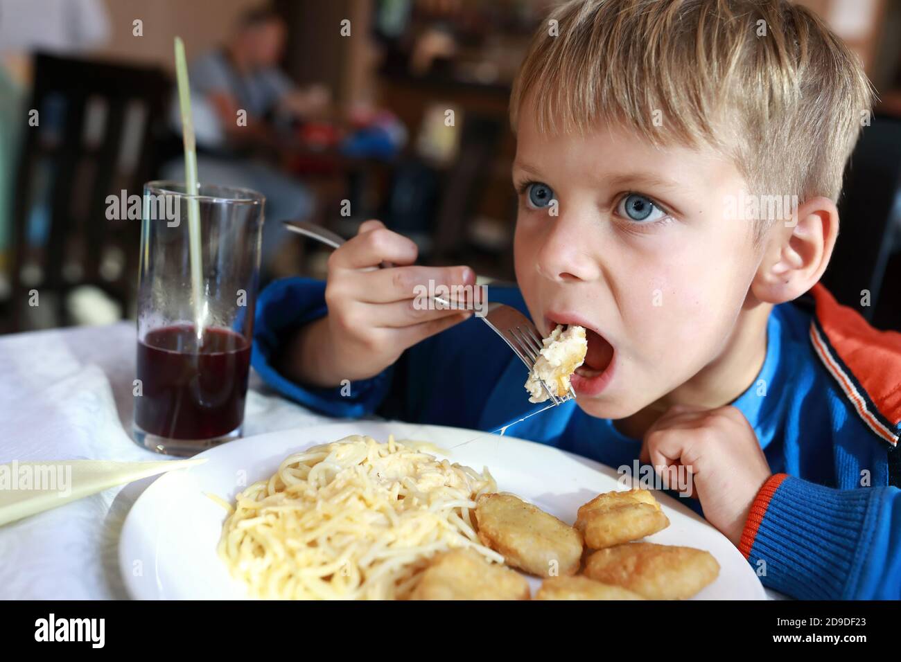 Boy chicken nugget hi-res stock photography and images - Alamy